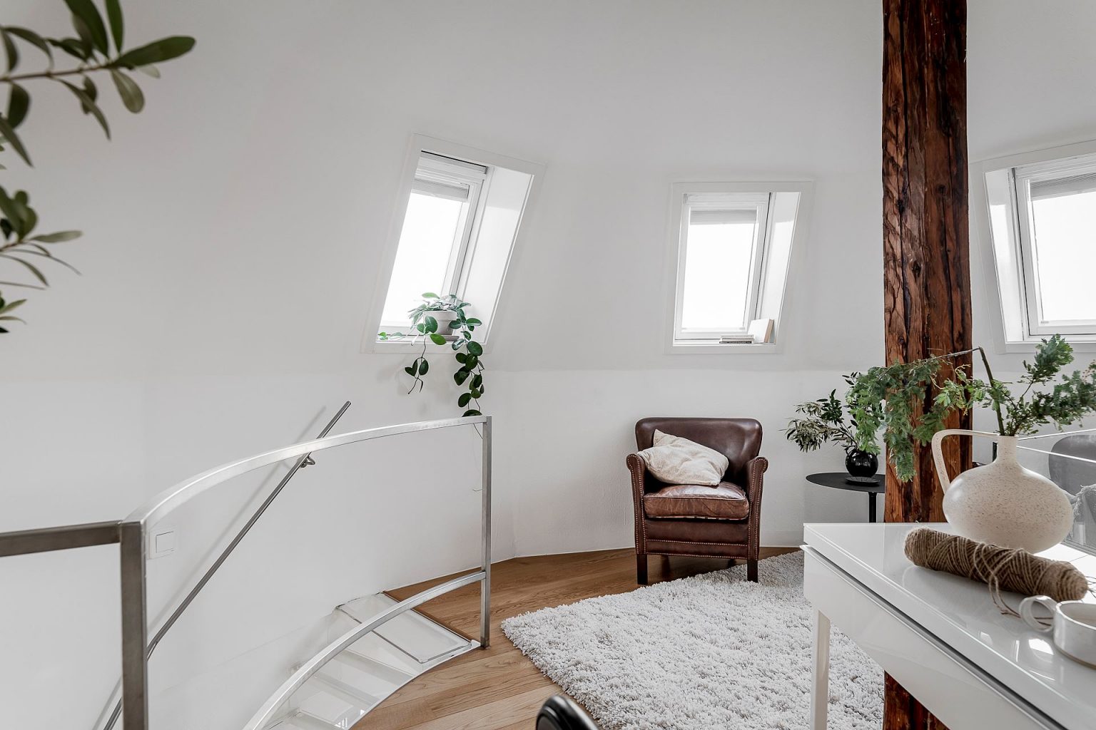 A charming attic apartment with tower room – Focal Point